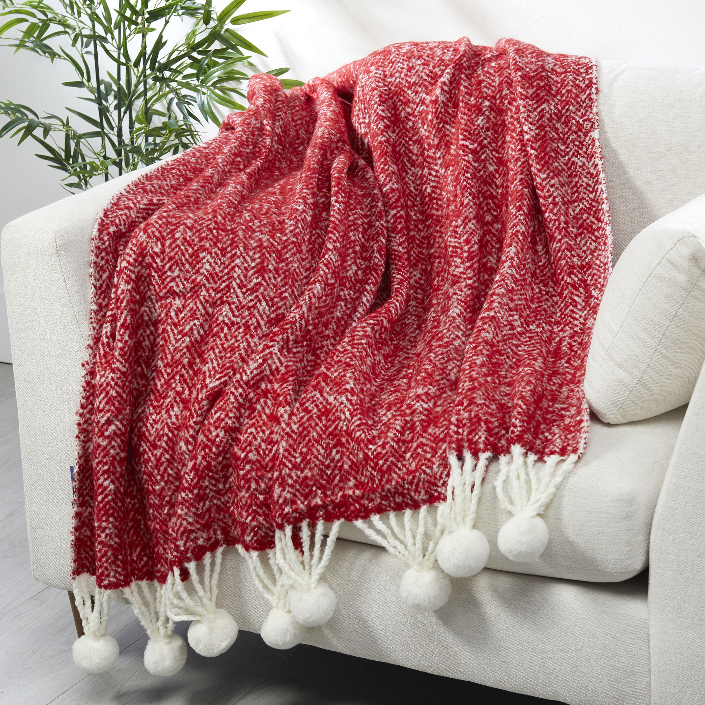 Emryn House Woven Herringbone Throw with Pompoms | HSN
